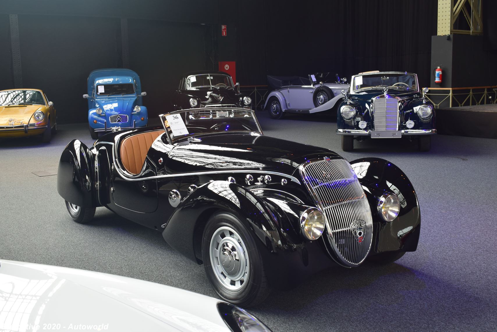 Bonhams joined Autoworld this weekend to break the COVID curse | Egzostive